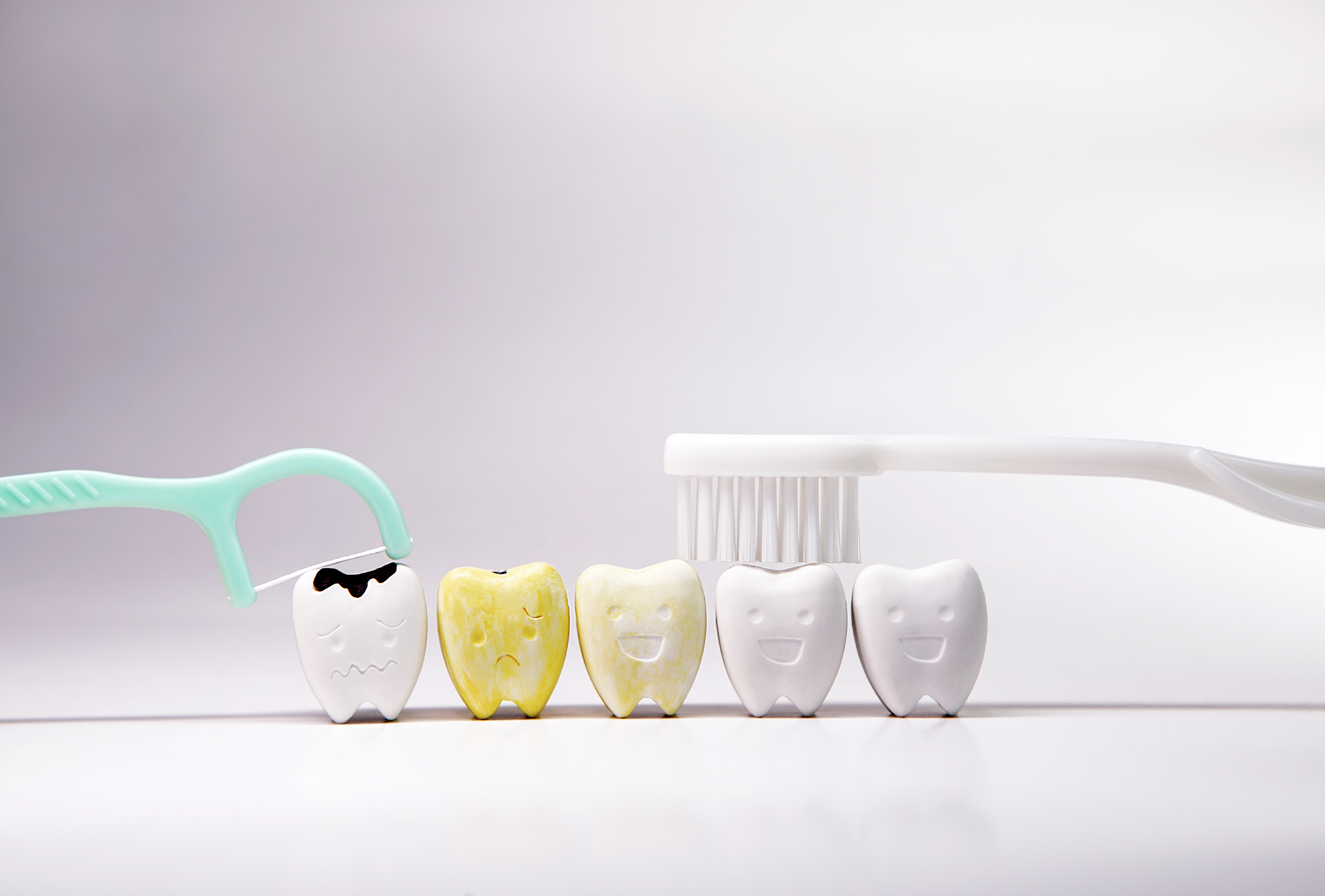 Does a Tan Make Teeth Look Darker? Whitening Tips